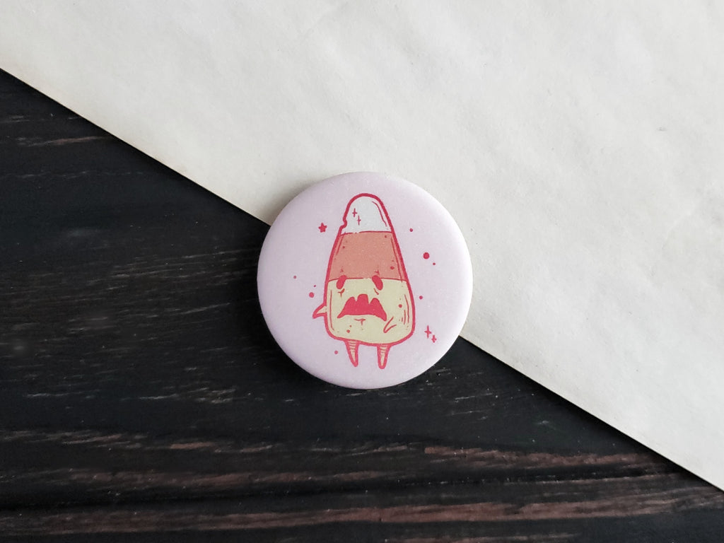 Candy Corn Creep pin badge – Paper Haunt / White Stag Art